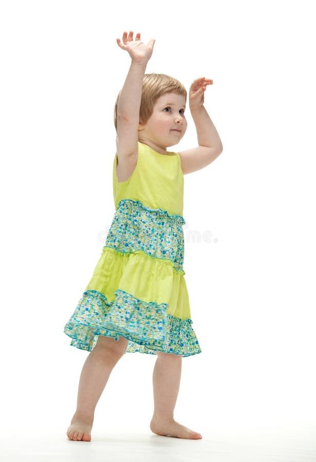 Playful baby girl dancing stock image. Image of small - 25035967