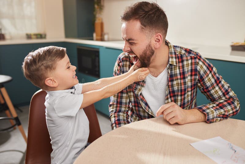 Father and Son Having Fun at Home Stock Image - Image of childhood ...