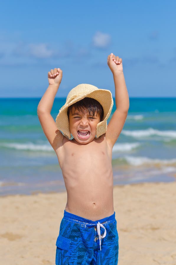 Playful child in the beach stock image. Image of coast - 20779527