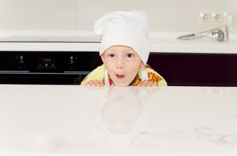 Child Chefs Toque Hiding Behind Counter Stock Photos - Free & Royalty ...