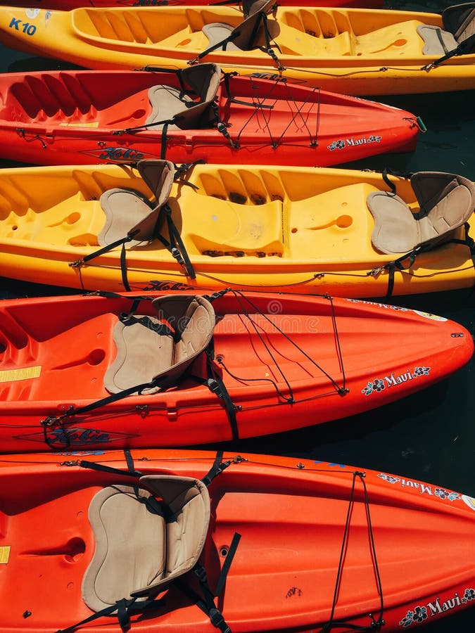 Playful colors of canoes editorial photography. Image of vacation ...