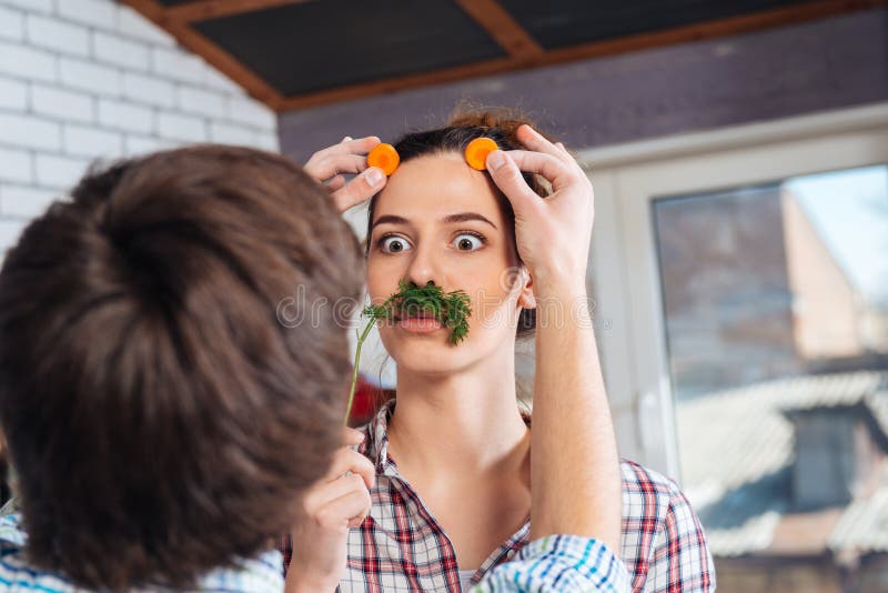 Playful Couple Having Fun and Making Funny Face on Kitchen Stock Photo ...