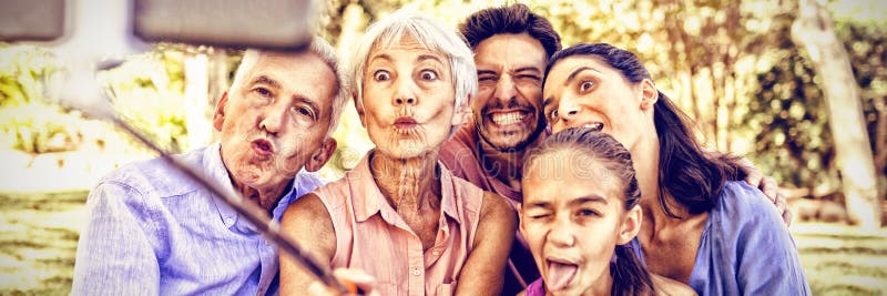 Family Making Funny Faces while Taking a Selfie in the Park Stock Photo ...