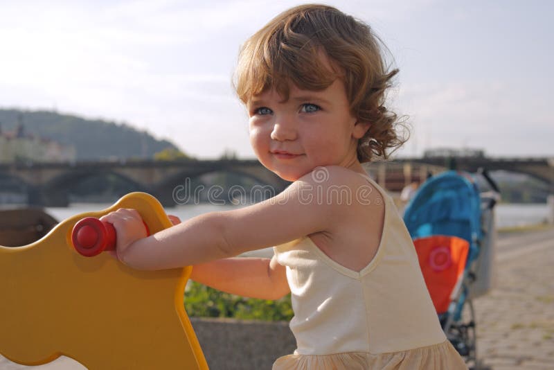 Playful girl rocking stock image. Image of outdoors, play - 5391347