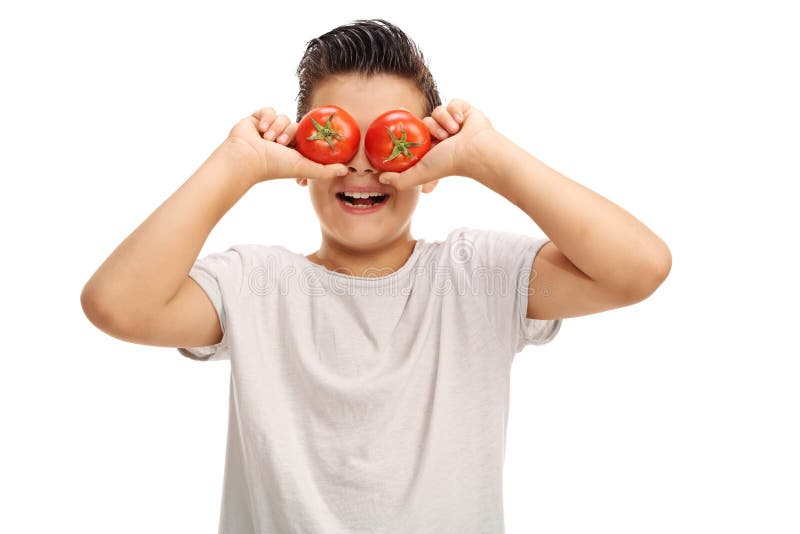 Playful Kid Holding Tomatoes on His Eyes Stock Photo - Image of looking ...