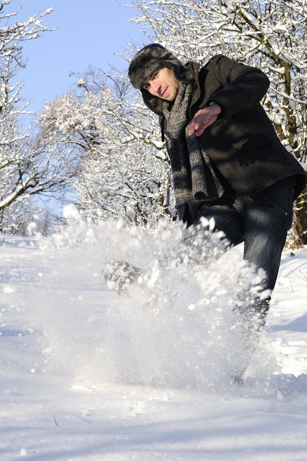 Playful Man Fighting with Snow Stock Image - Image of casual, beauty ...