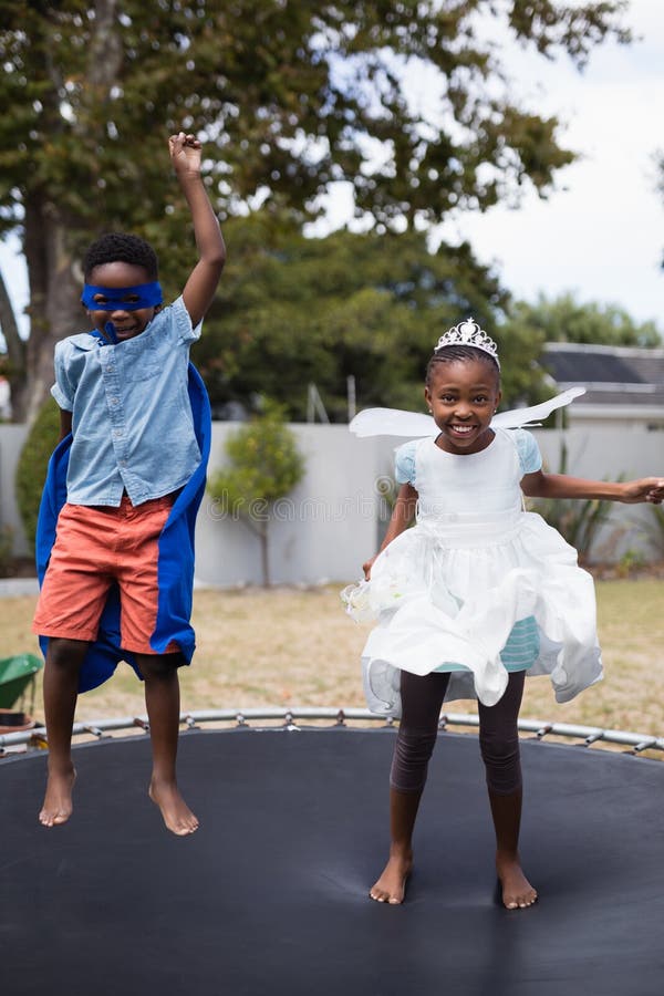 Boy Jumping on a Trampoline Stock Image - Image of face, jumping: 9333255