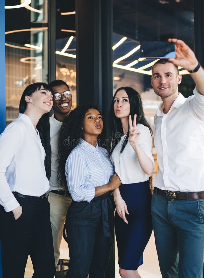 Playful Staff Taking Selfie at Workplace Stock Photo - Image of ...