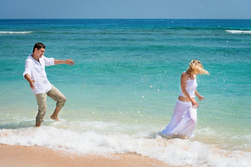 Playful Young Couple Have a Fun in Tropical Sea Stock Image - Image of ...