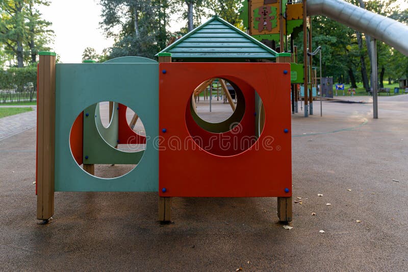 A Playground Area Features a Vibrant Play Structure in a Park during ...