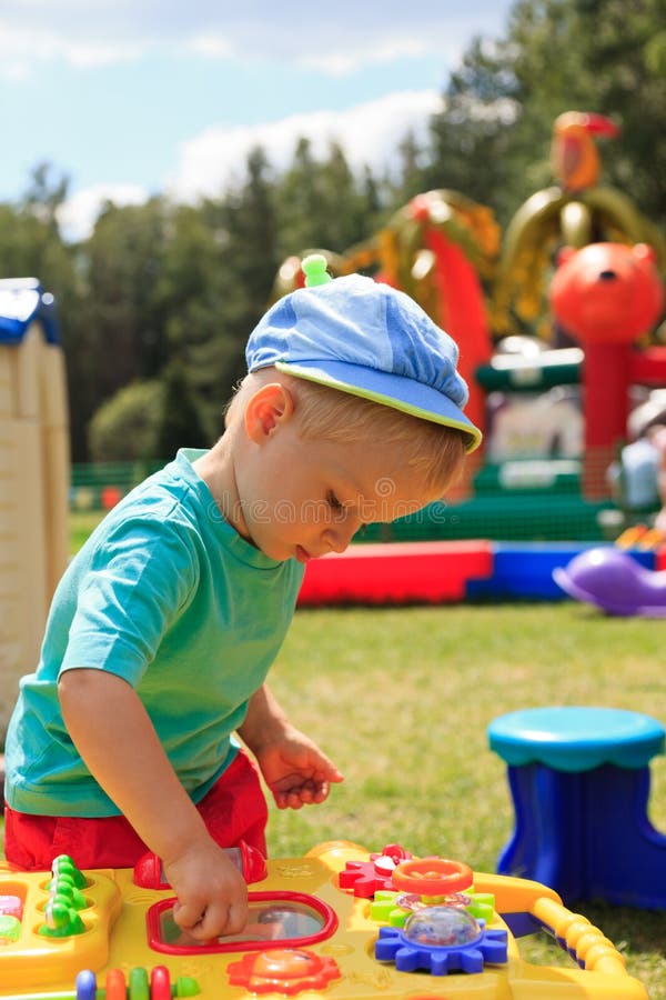 Toddler at the playground stock image. Image of recreation - 15024721
