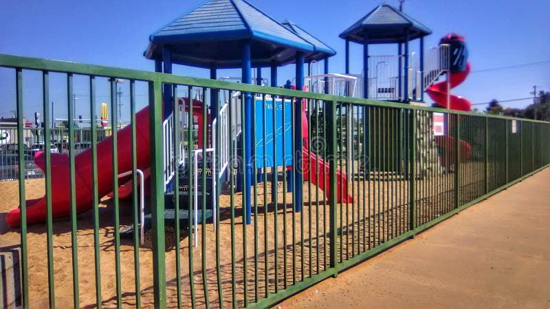 Playground Behind Bars with Blue Sky Stock Image - Image of bars, steps ...