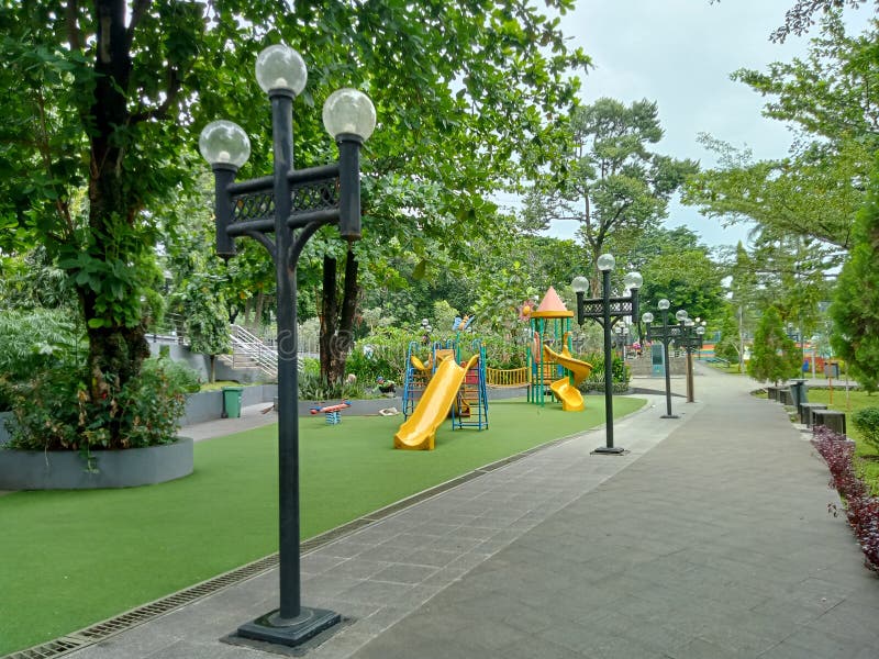 Playground with Garden Lights on the Side Stock Image - Image of side ...