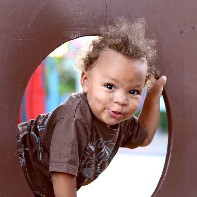 Playground hidey hole look stock photo. Image of looking - 22600396