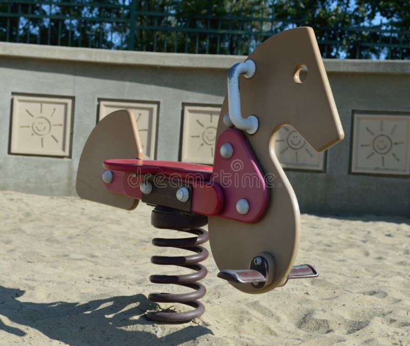 Playground Horse Spring Ride Stock Image - Image of holes, roof: 39969619