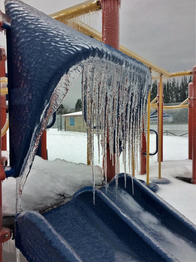 Playground Ice Storm stock photo. Image of water, snow - 90898146