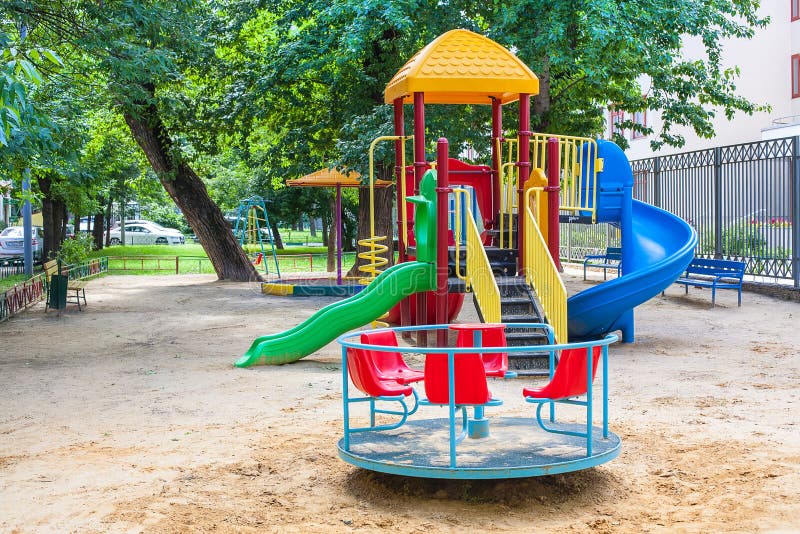 Playground of kindergarten stock photo. Image of carousel - 97788056