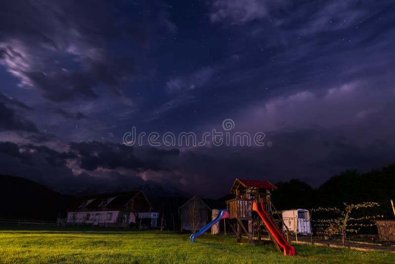 Playground in the night stock image. Image of equipment - 97624025
