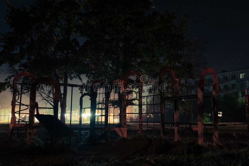 Playground at night stock photo. Image of night, park - 100295088