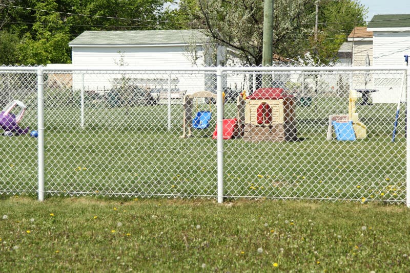 Playground Outside the Fence Stock Photo - Image of group, garden: 31090744