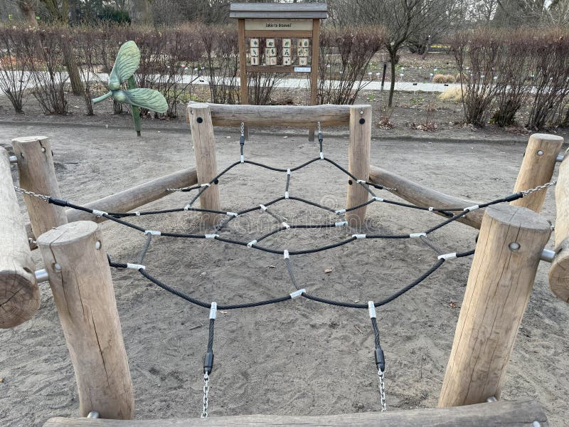 A Playground in the Park with an Interactive Board about Trees and ...
