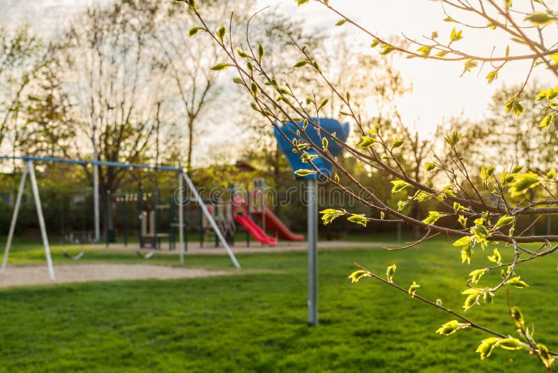 Playground in the Park on a Sunny Spring Day. Stock Photo - Image of ...