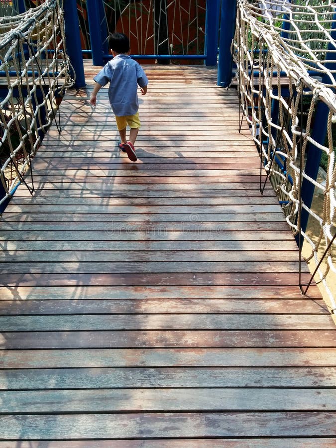 Playground rope bridge stock image. Image of concentrate - 51690649