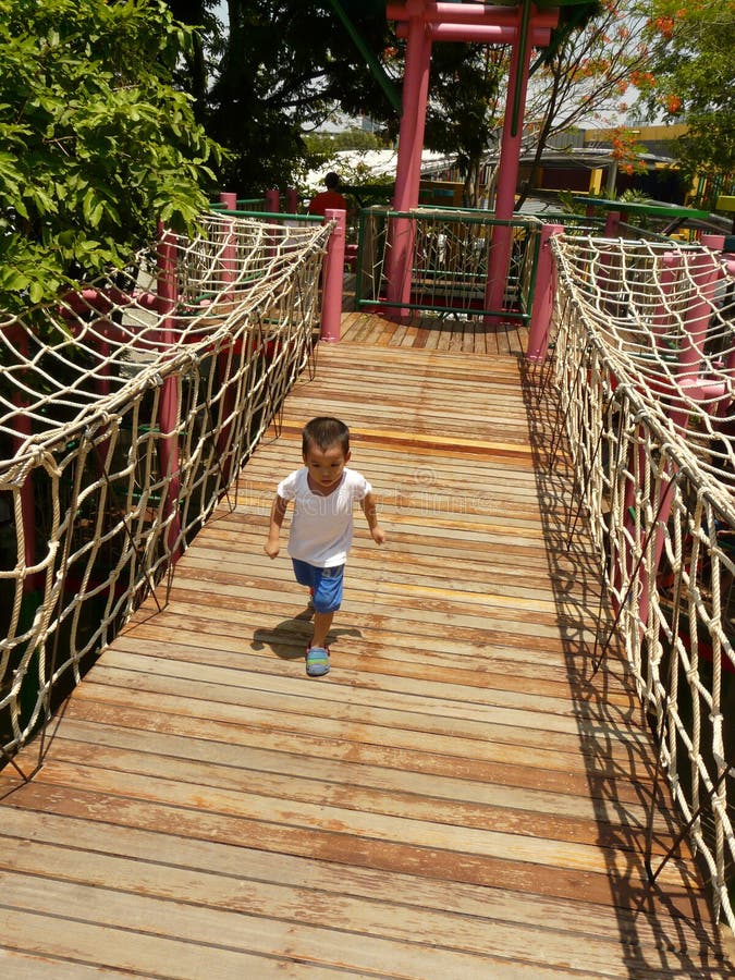 Playground rope bridge stock image. Image of concentrate - 51690649