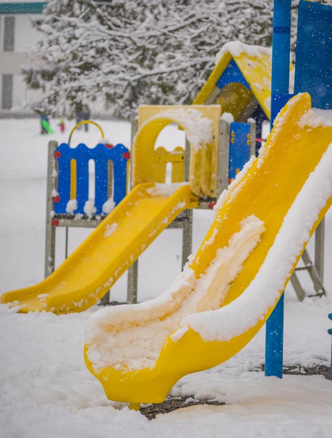 Playground with snow stock image. Image of park, slide - 39765601