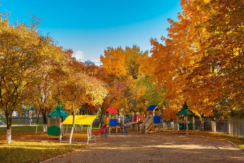 Playground Strewn with Yellow Autumn Leaves Trees Stock Image - Image ...