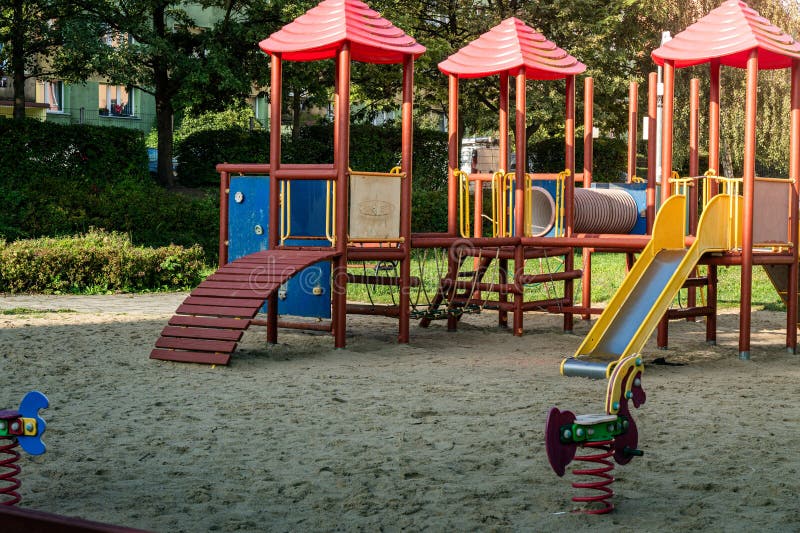 Playground Structures with Slides and Climbing Features in a Sunny Park ...