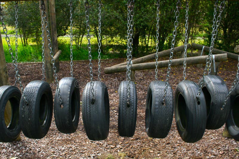 Playground Tire Bridge Swing Stock Image - Image of outdoors, aligned ...