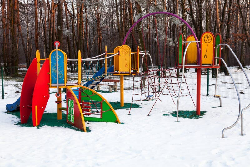 A playground in winter. stock photo. Image of frozen - 138924346