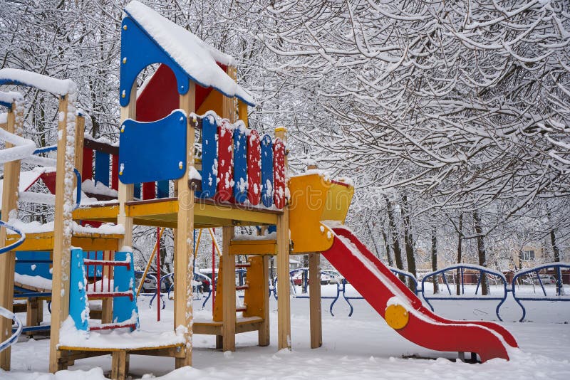 Playground in Winter in the Snow,an Empty Playground in Winter, a Slide ...