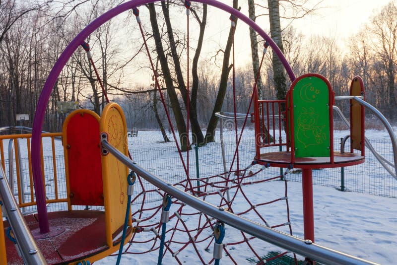 A Playground in Winter during Sunset Stock Photo - Image of recreation ...