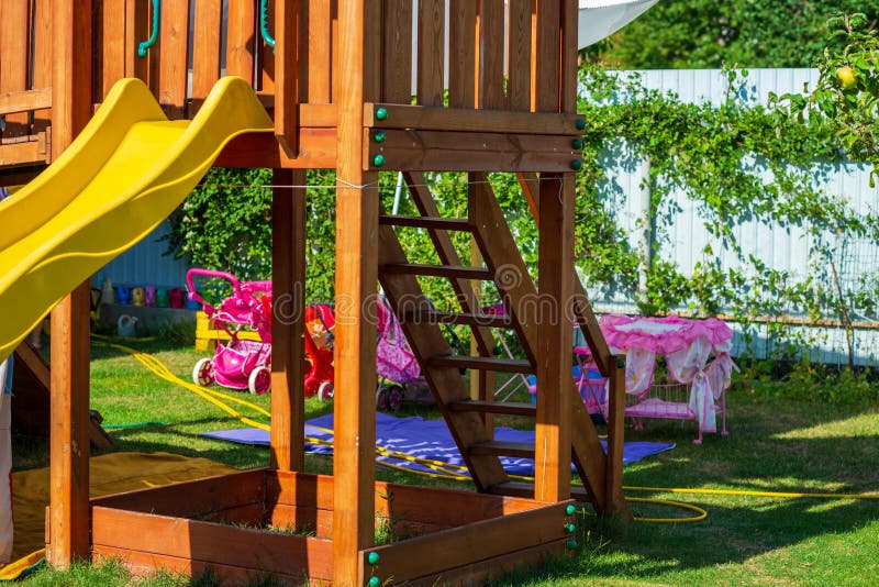 Playground in the Yard. a Place for Children To Play in the Yard Stock ...