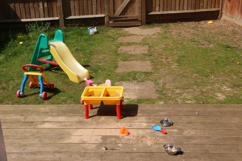 Playing Around with the Toys on the Lawn Stock Photo - Image of ...