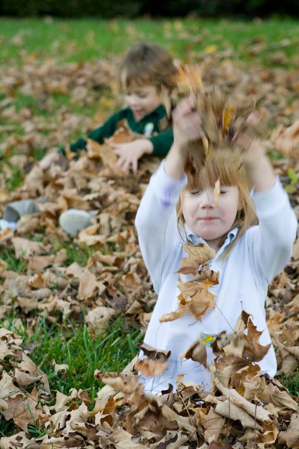 Playing In The Autumn Leaves Picture. Image: 6825205