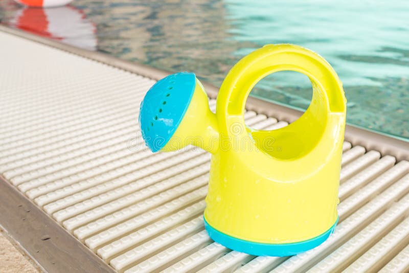 Playing in a baby pool stock photo. Image of turquoise - 48826072