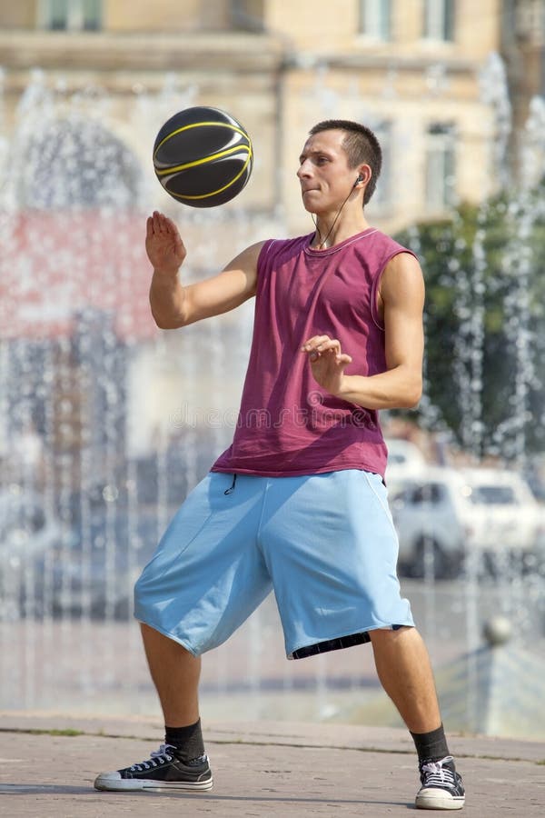 Playing with a ball. stock image. Image of recreational - 44510049