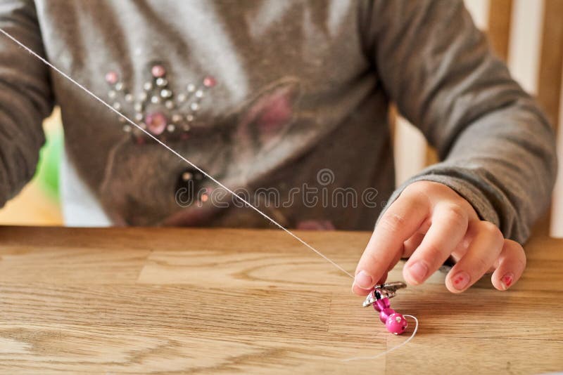 Playing with Beads and String. Stock Image - Image of white, making ...