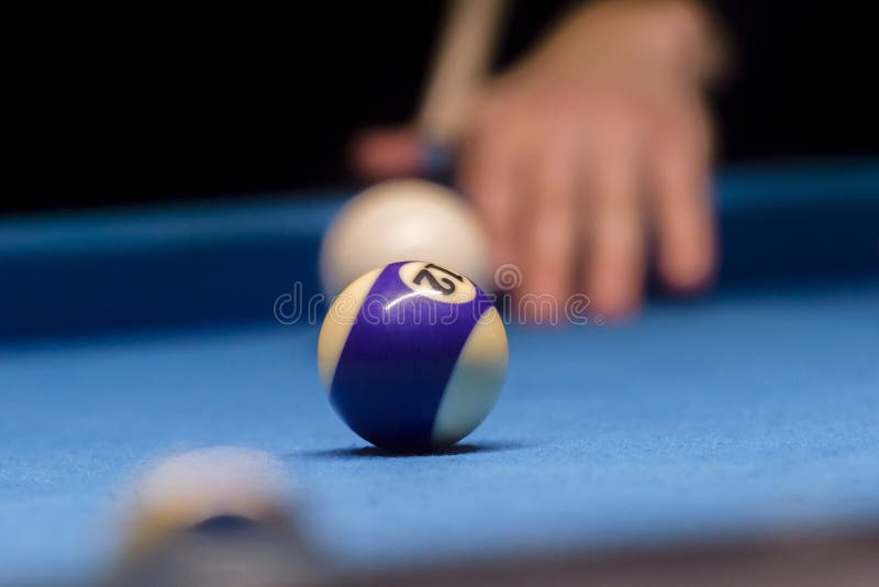 Playing Billiard. Billiards Balls and Cue on Blue Billiards Tabl Stock ...