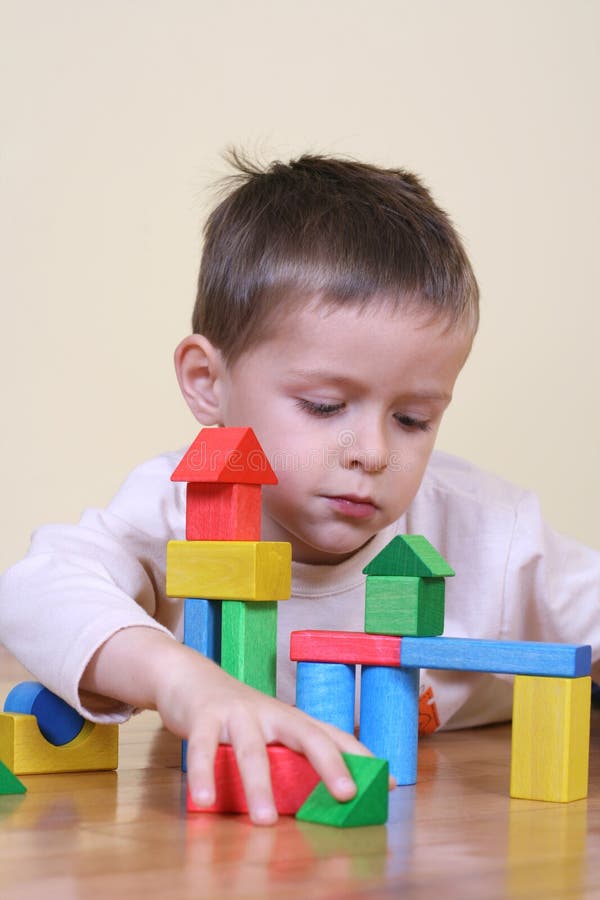 Playing with cube blocks stock image. Image of girl, bricks - 1873553