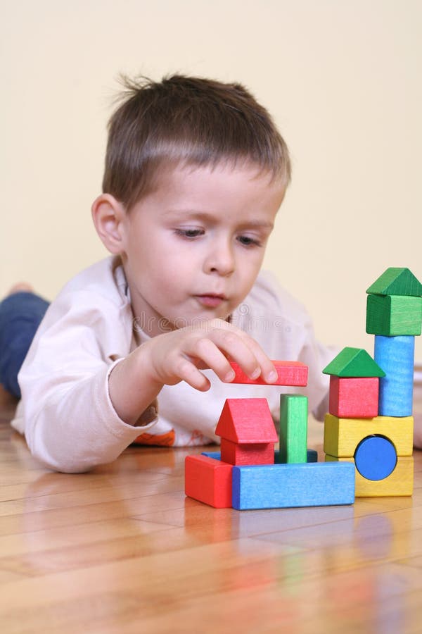 Playing with blocks stock photo. Image of children, build - 1372286