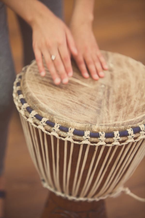 Playing the bongo drum stock photo. Image of sound, music - 105441658
