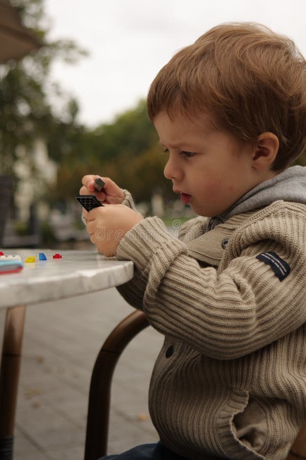 Playing boy stock image. Image of enjoying, attentive - 12328117