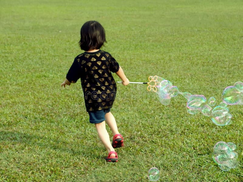 Playing bubbles for fun stock image. Image of little - 110372653
