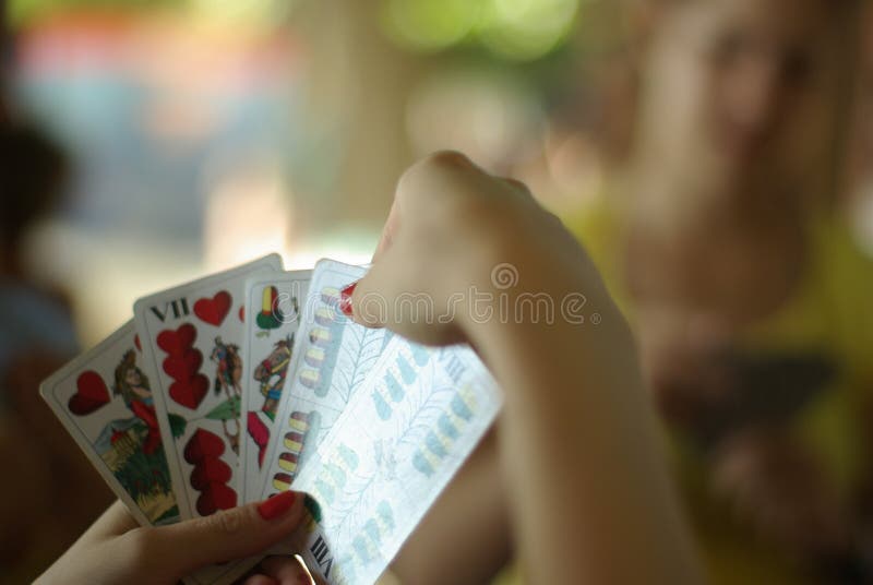Playing a Card Game in Shallow Depth of Field Stock Image - Image of ...