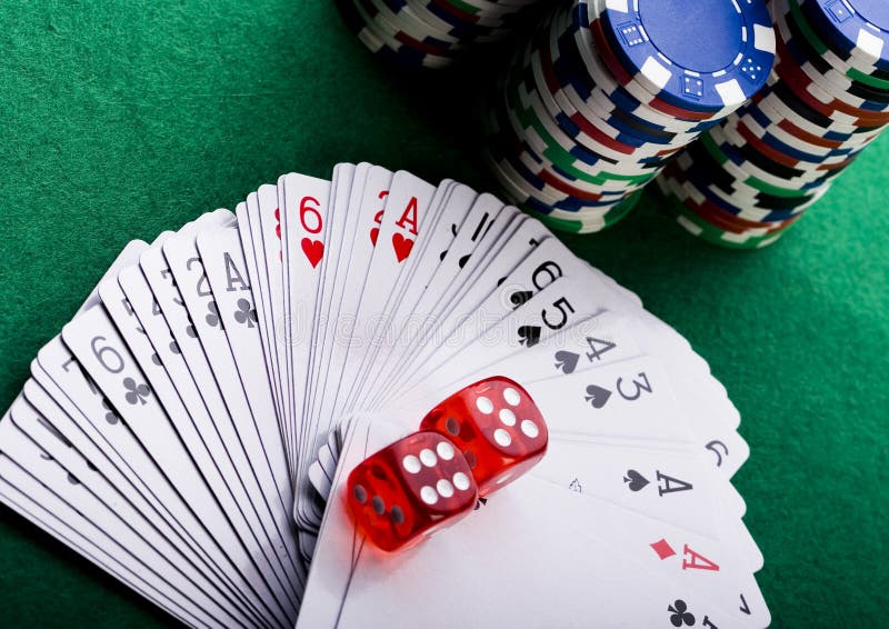 Playing cards in casino stock photo. Image of joker, chips - 4697428
