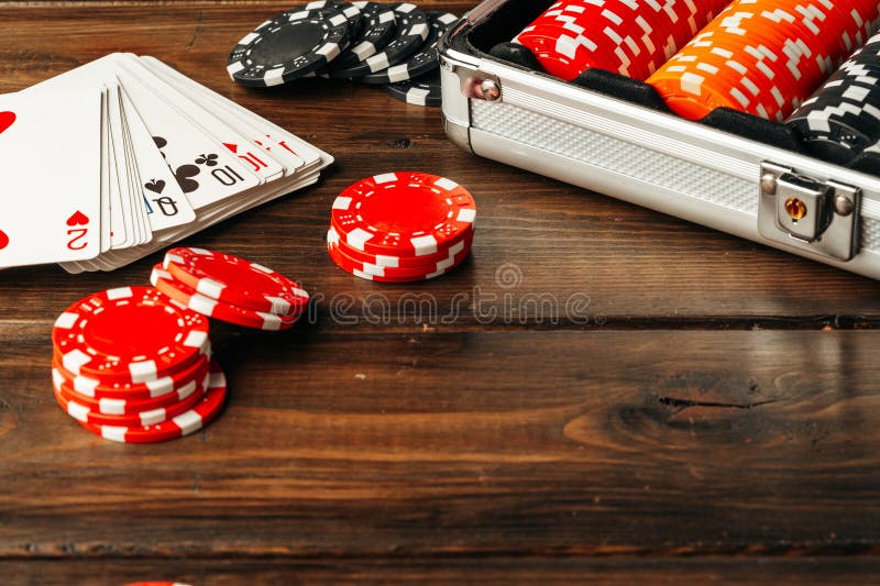 Playing Cards and Chips in a Case on Wooden Table Close Up Stock Photo ...